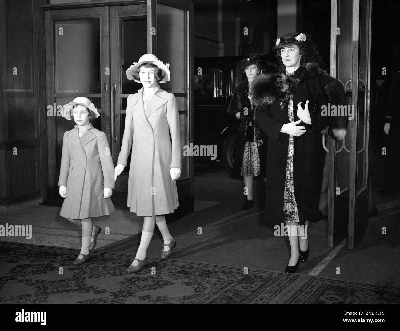 Britain's Princess Elizabeth and Princess Margaret, left, arriving at ...