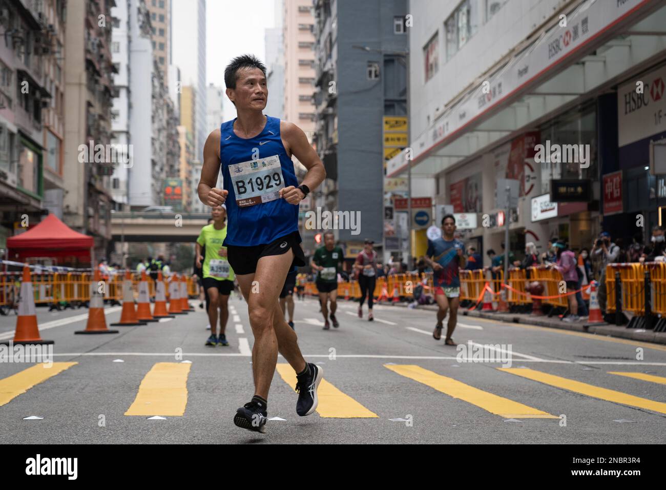Hong Kong, China. 12th Feb, 2023. A runner seen finishing his final ...