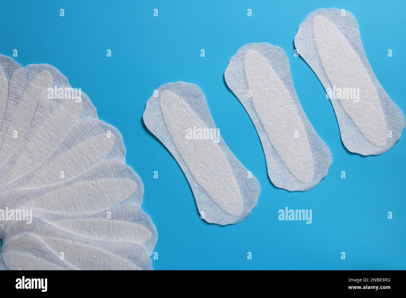 women's hygiene products, daily sanitary pads, space for text ...