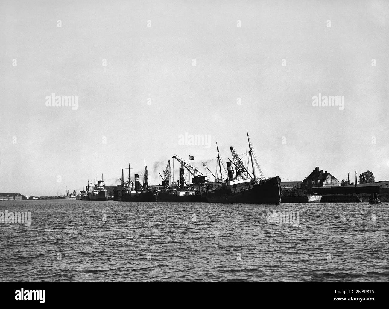 Ships unloading at the Kaiserhaven Docks, on the Vistula River, on June ...