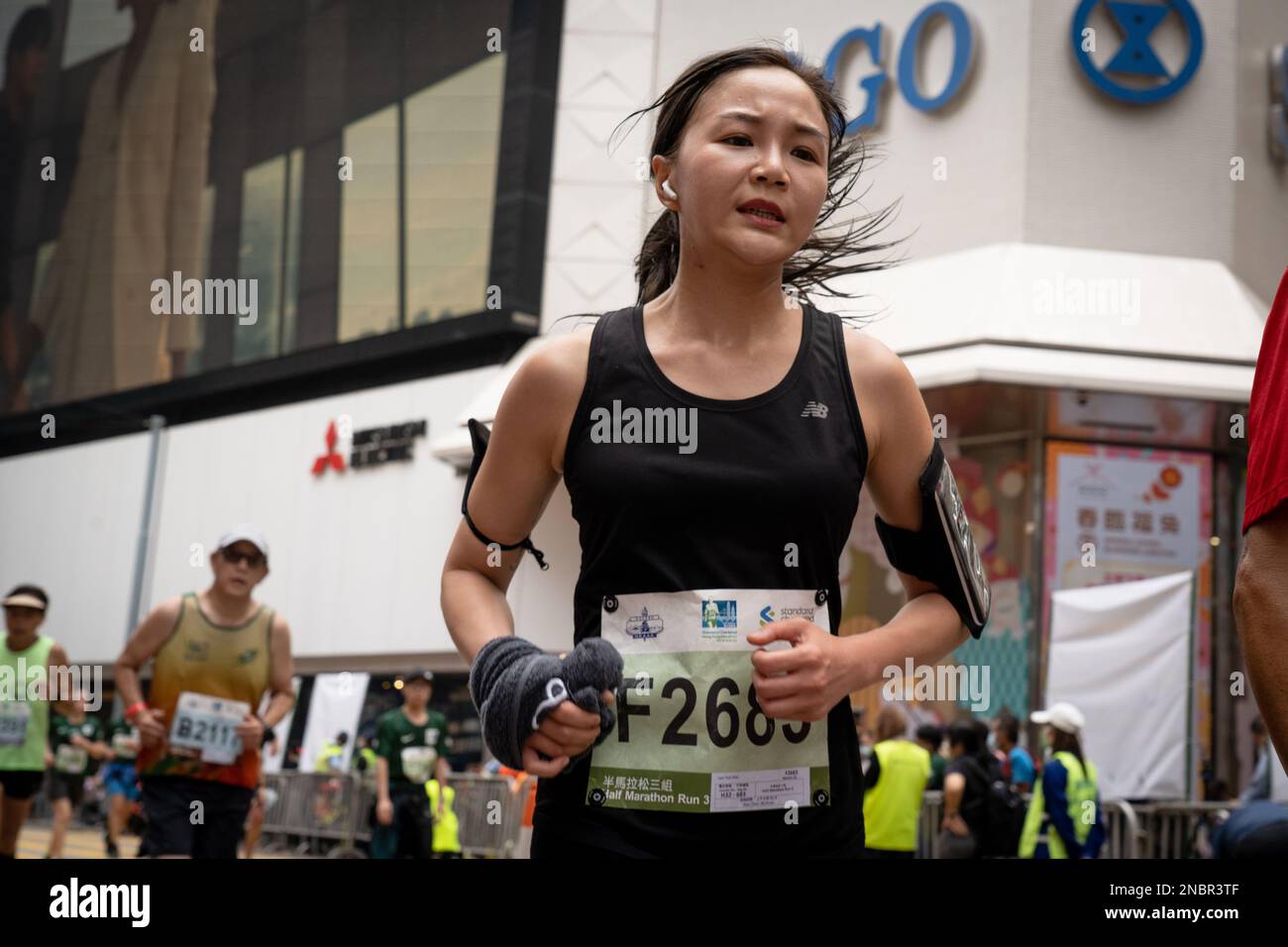 Hong Kong, China. 12th Feb, 2023. A runner seen sweating as she ...