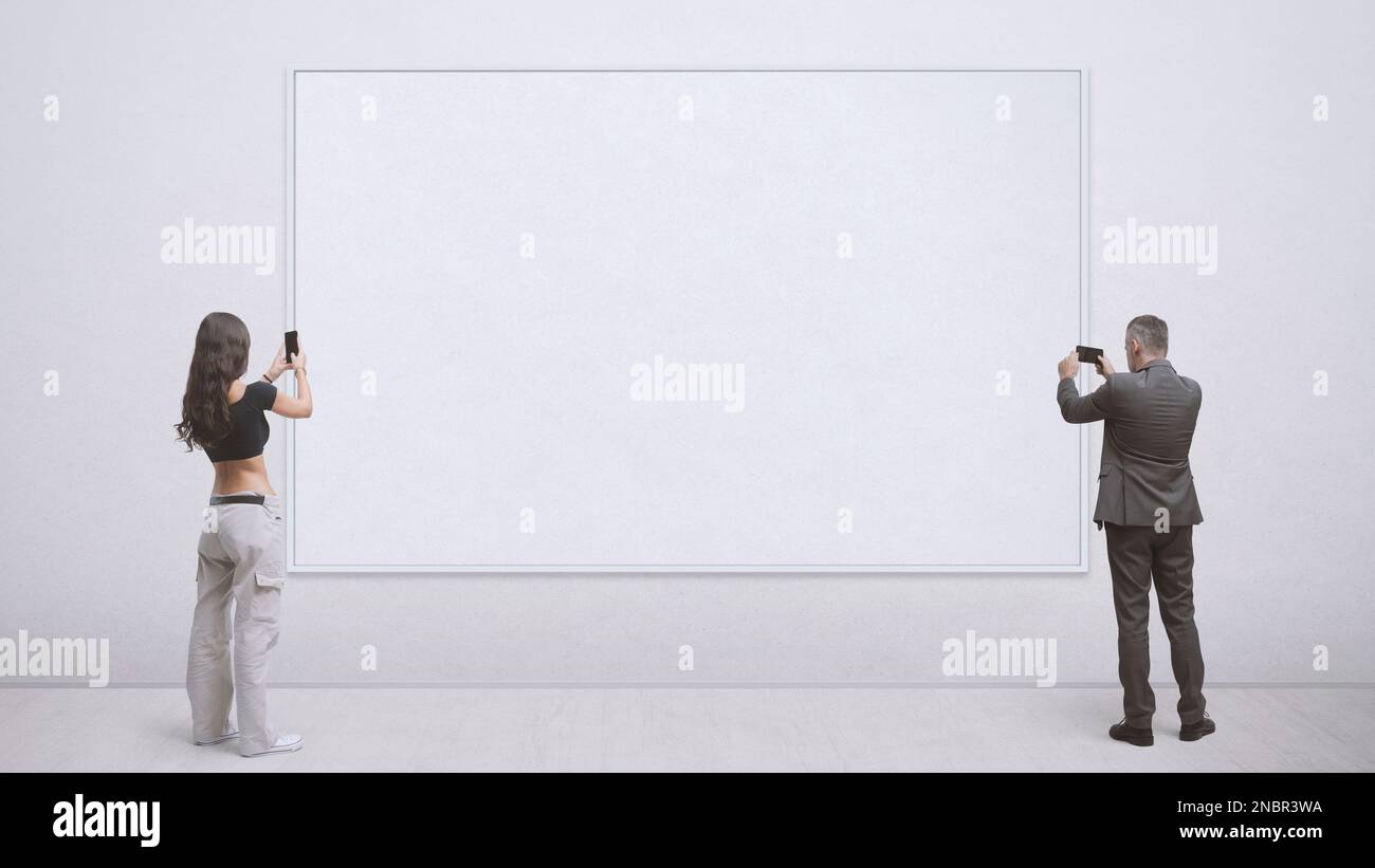 People at the art gallery, they are taking pictures of a painting using ...