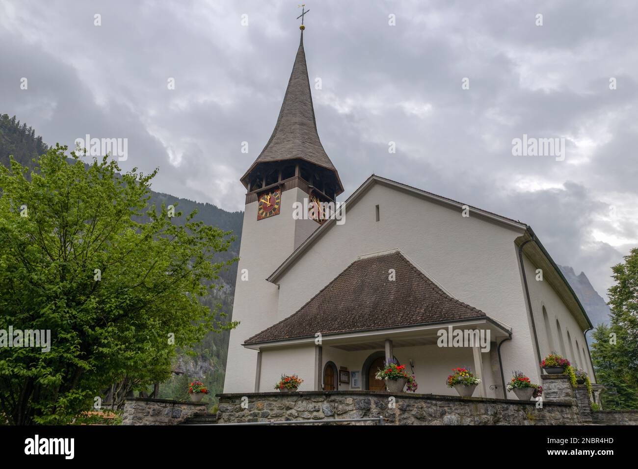 The church in the alpine town of Lauterbrunnen in the Bernese Oberland ...