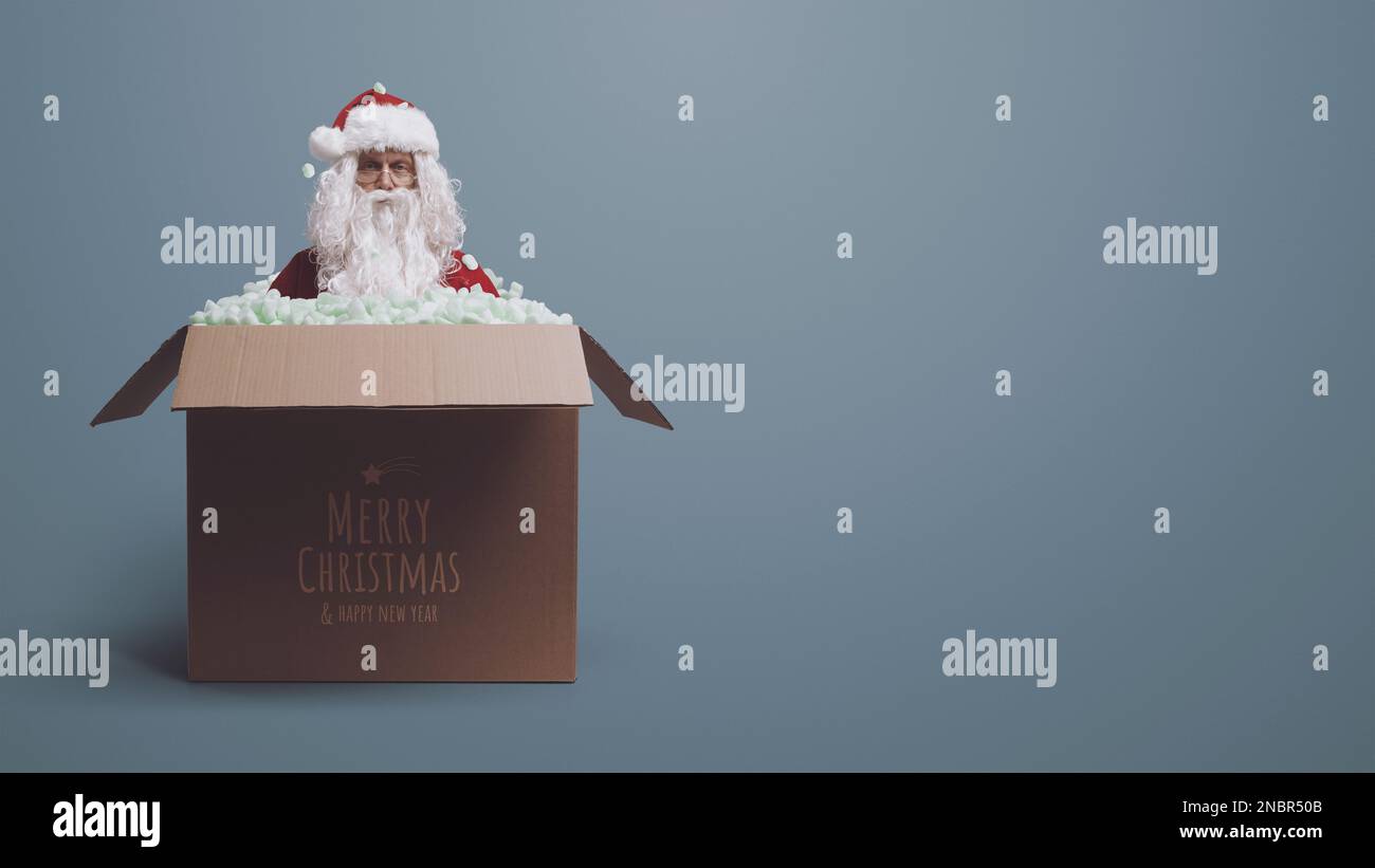 Surprised santa claus popping out hi-res stock photography and images ...
