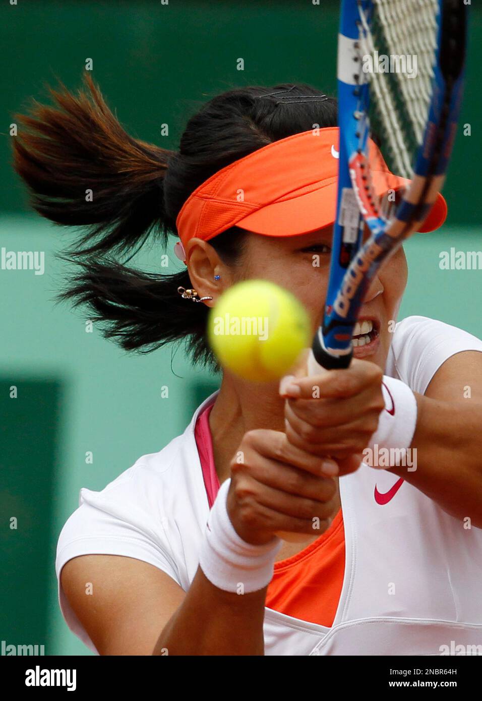 China's Li Na returns the ball to Spain's Silvia Soler-Espinosa during ...