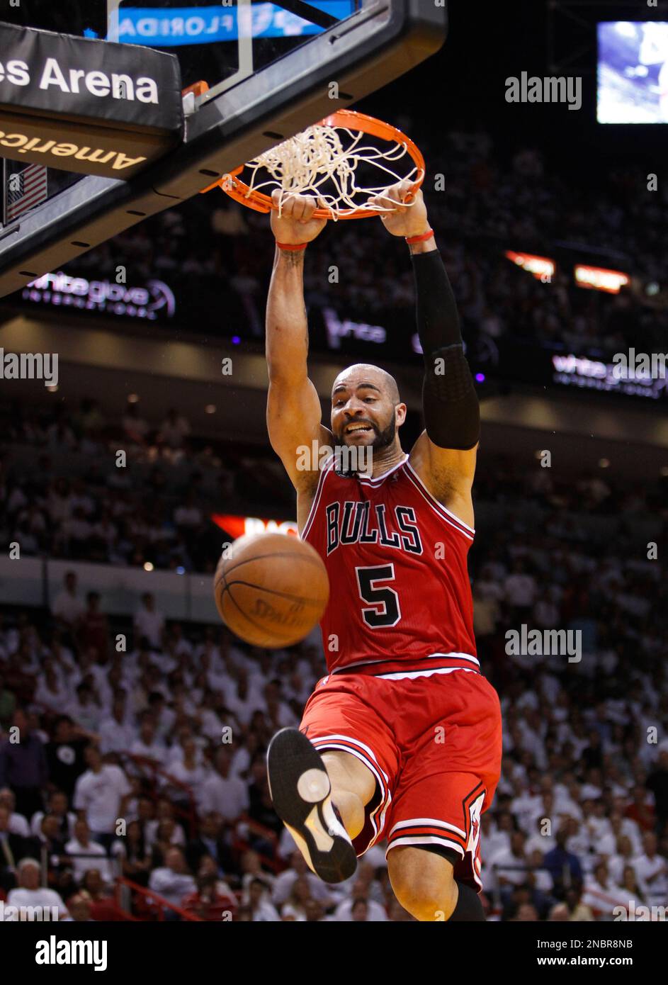 Chicago Bulls' Carlos Boozer dunks the ball during the first half of ...