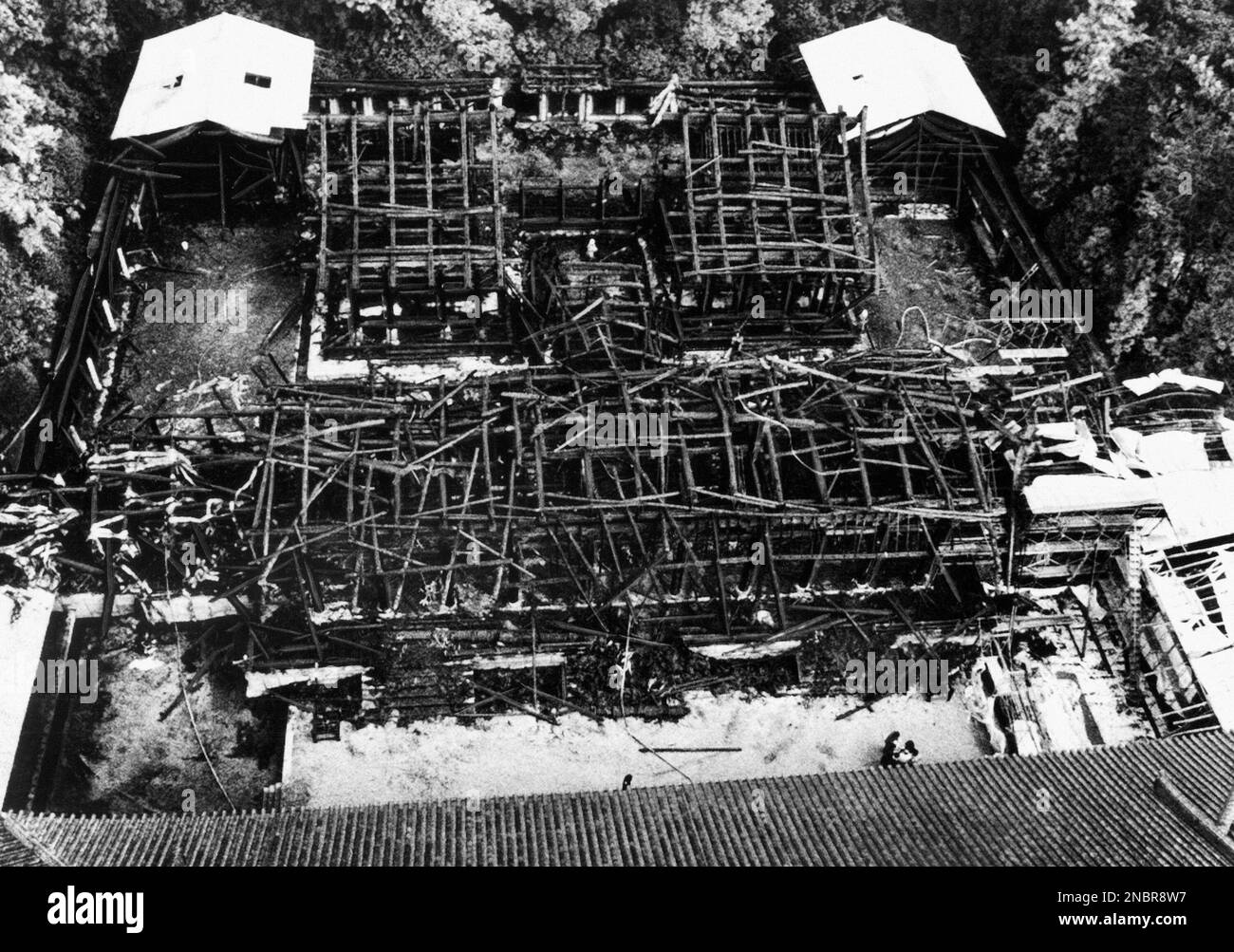 The burnt out wreckage of the main building and hall of the Heian ...