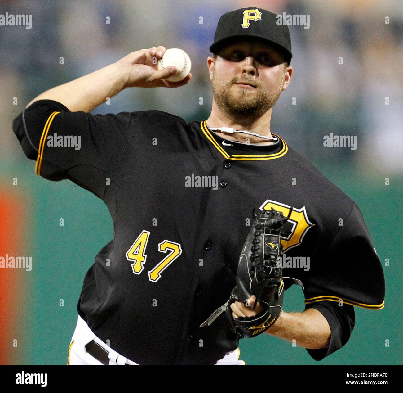 Pittsburgh Pirates' Evan Meek pitches in the ninth inning of a baseball ...