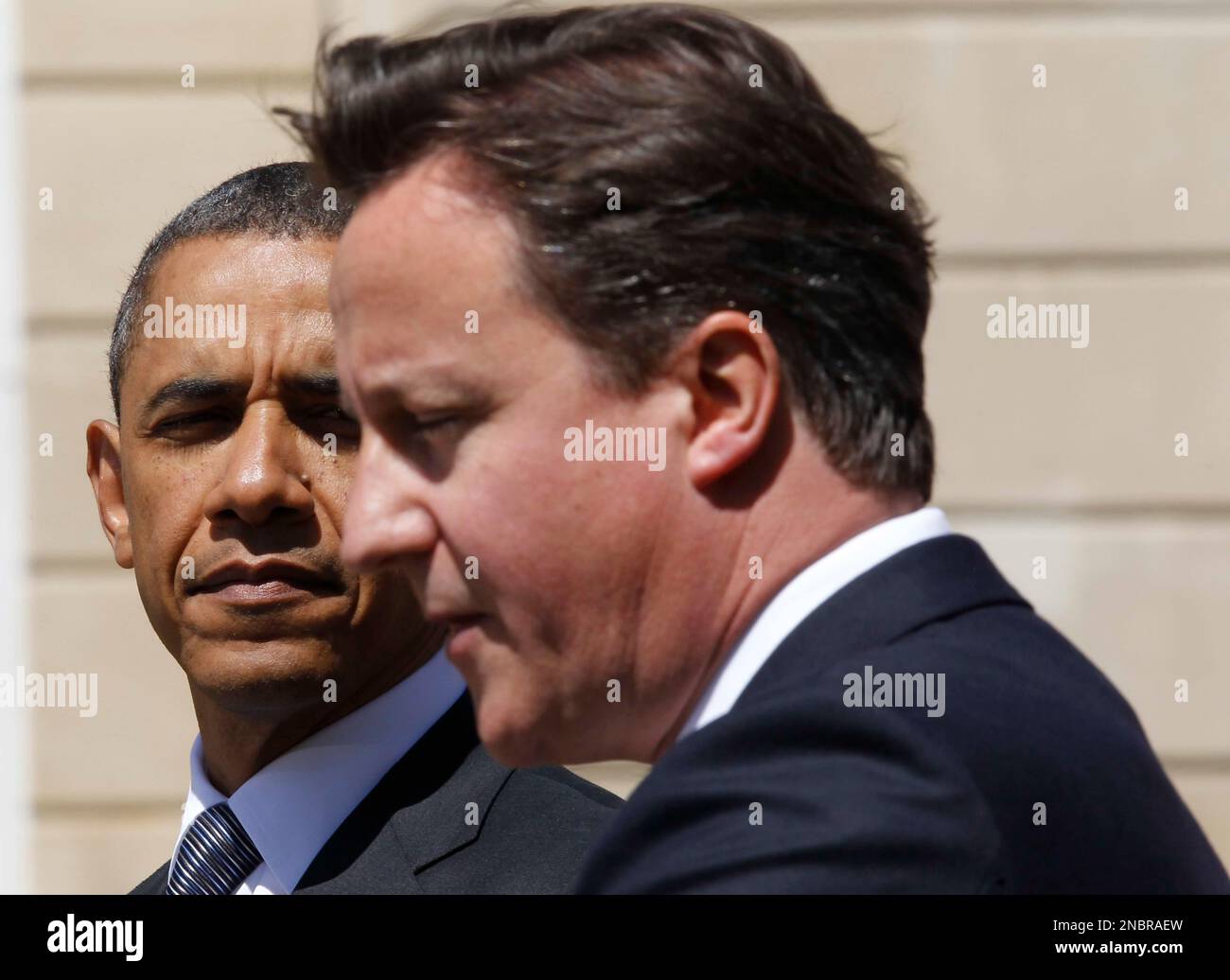 U.S. President Barack Obama and British Prime Minister David Cameron ...