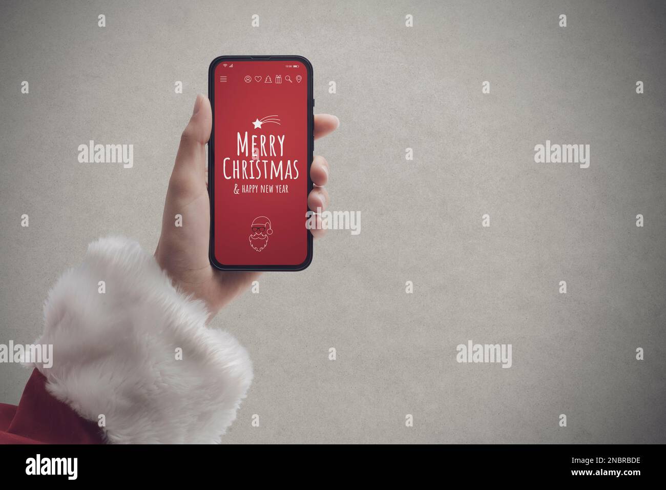 Santa claus showing mobile phone hi-res stock photography and images ...