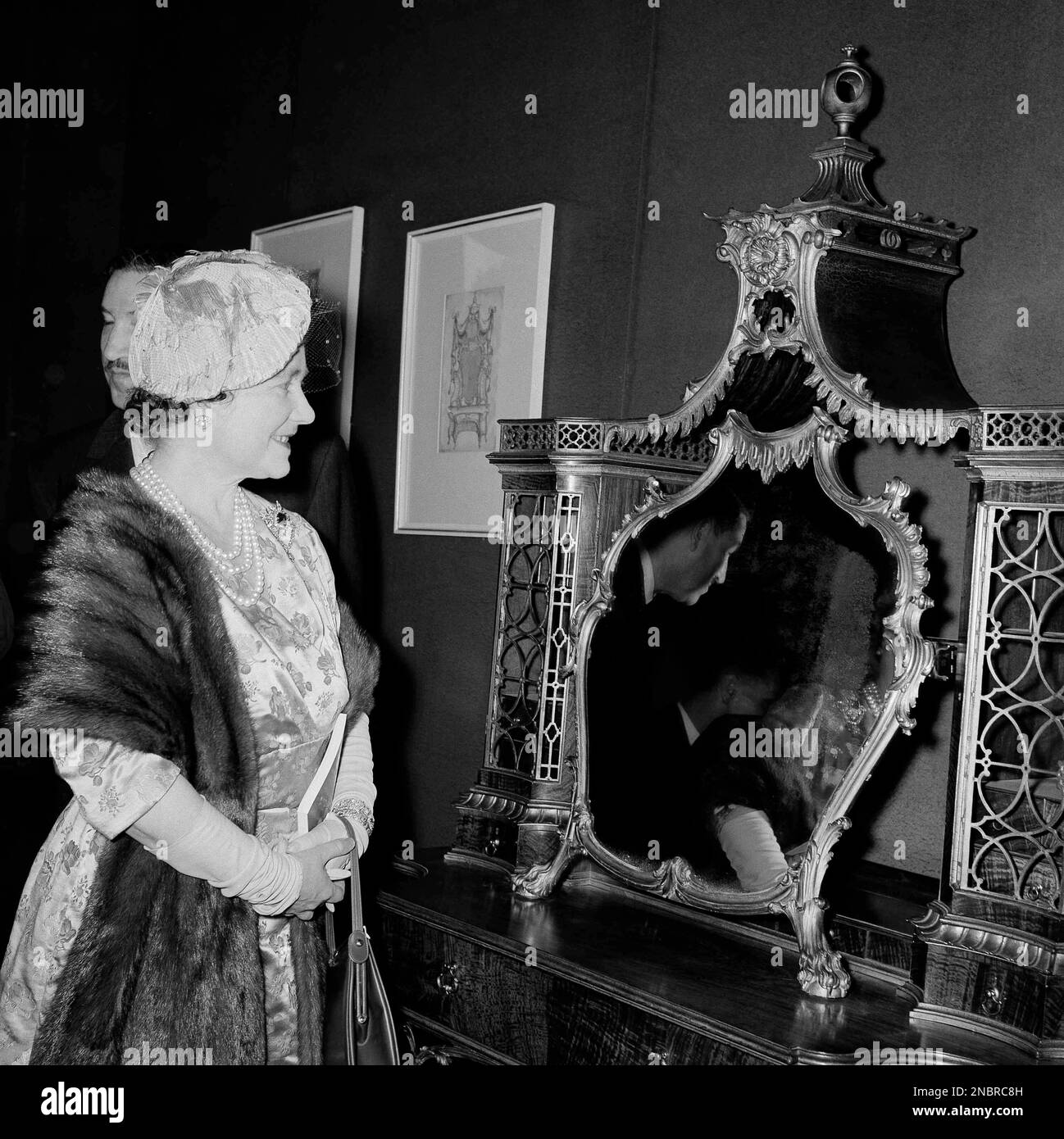 Queen Elizabeth, the Queen Mother tours the current exhibition of ...