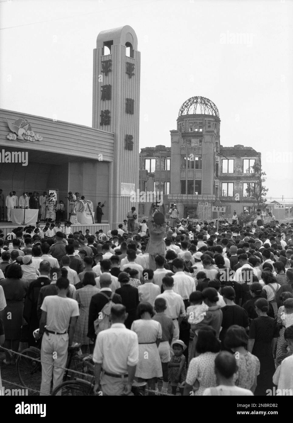 Residents of Hiroshima, Japan on August 16, 1947, stand before the new ...