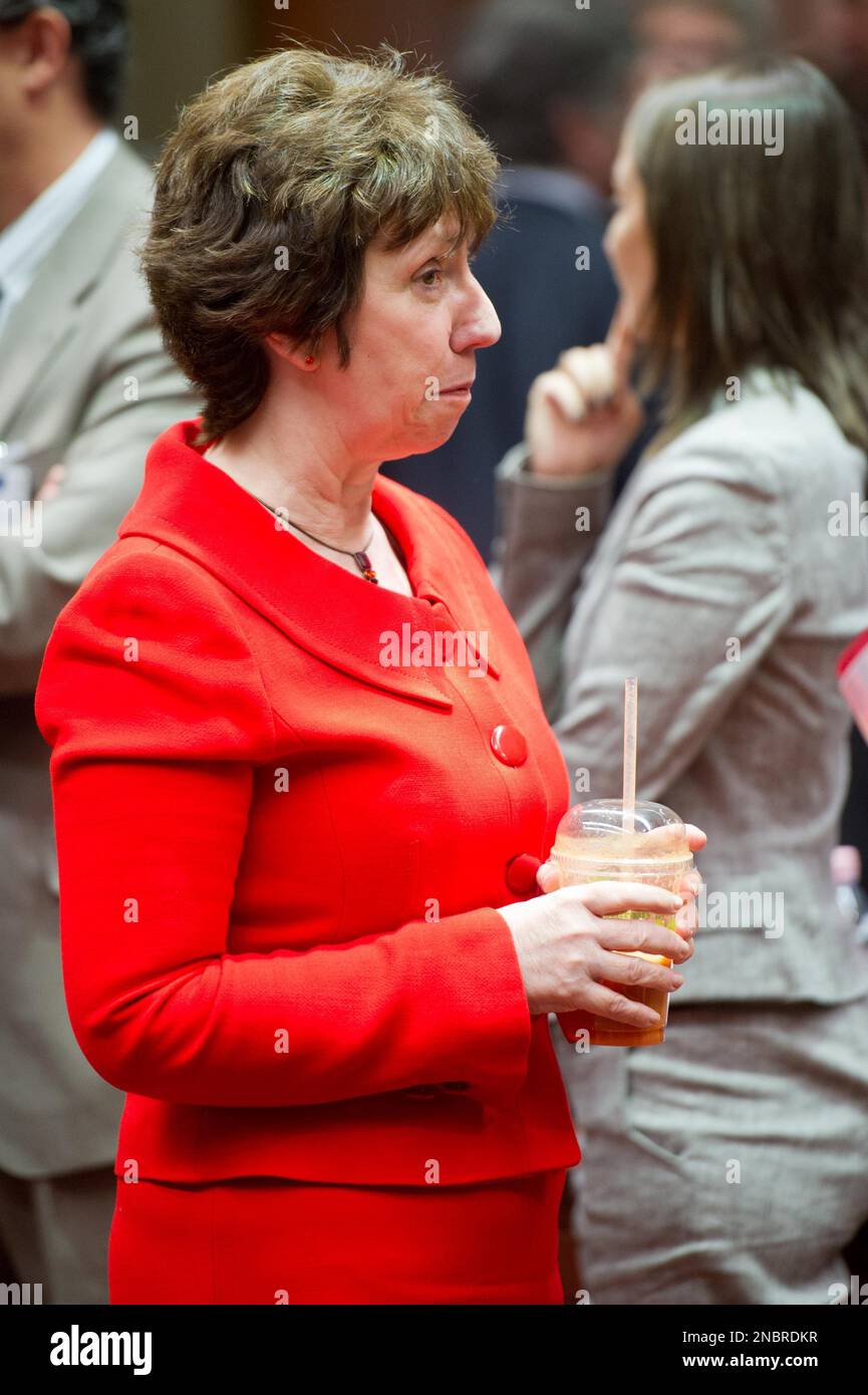 European foreign policy chief Catherine Ashton holds a smoothie as she ...