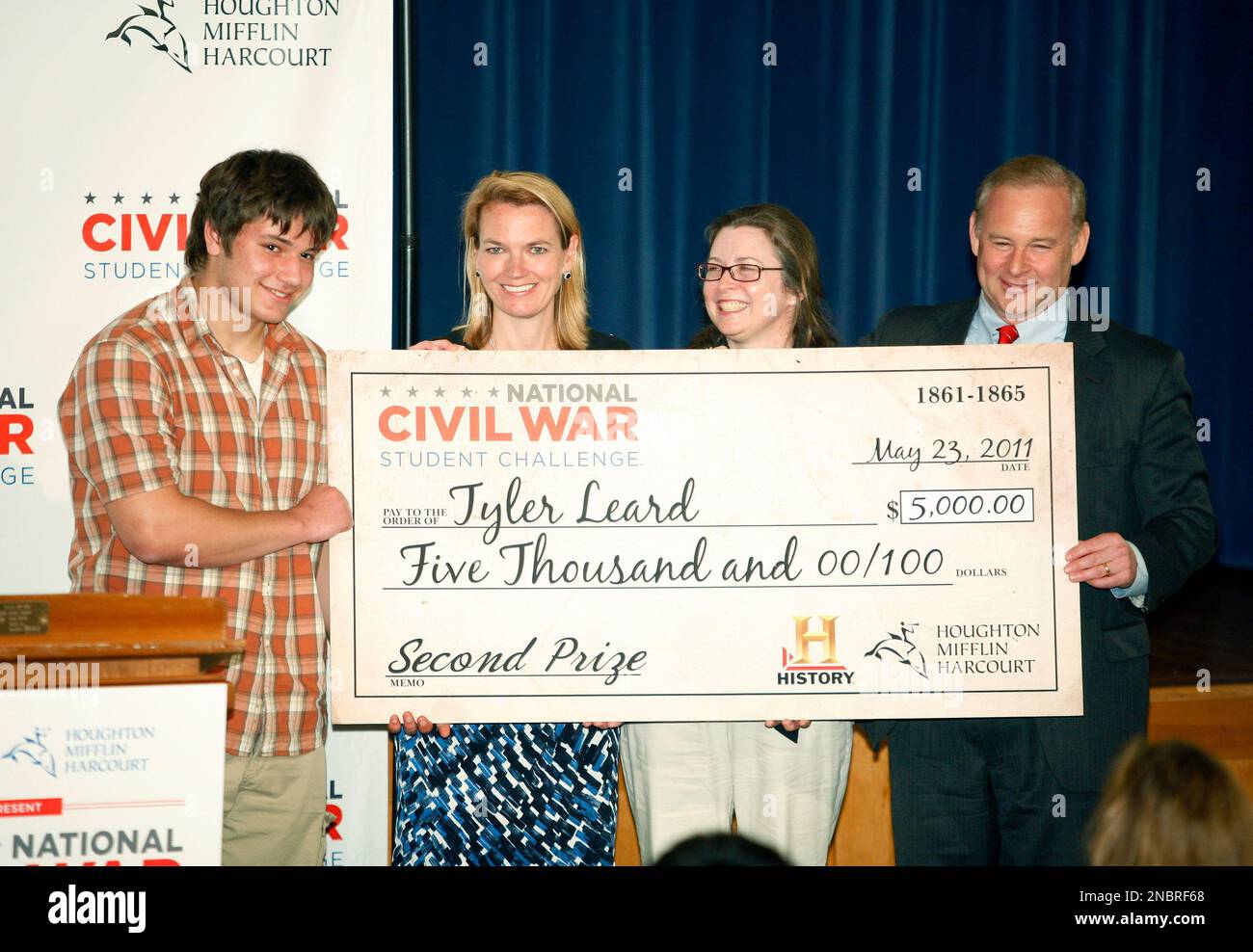Tyler Leard, left, a junior at Wissahickon HS, poses for a photo with a ...