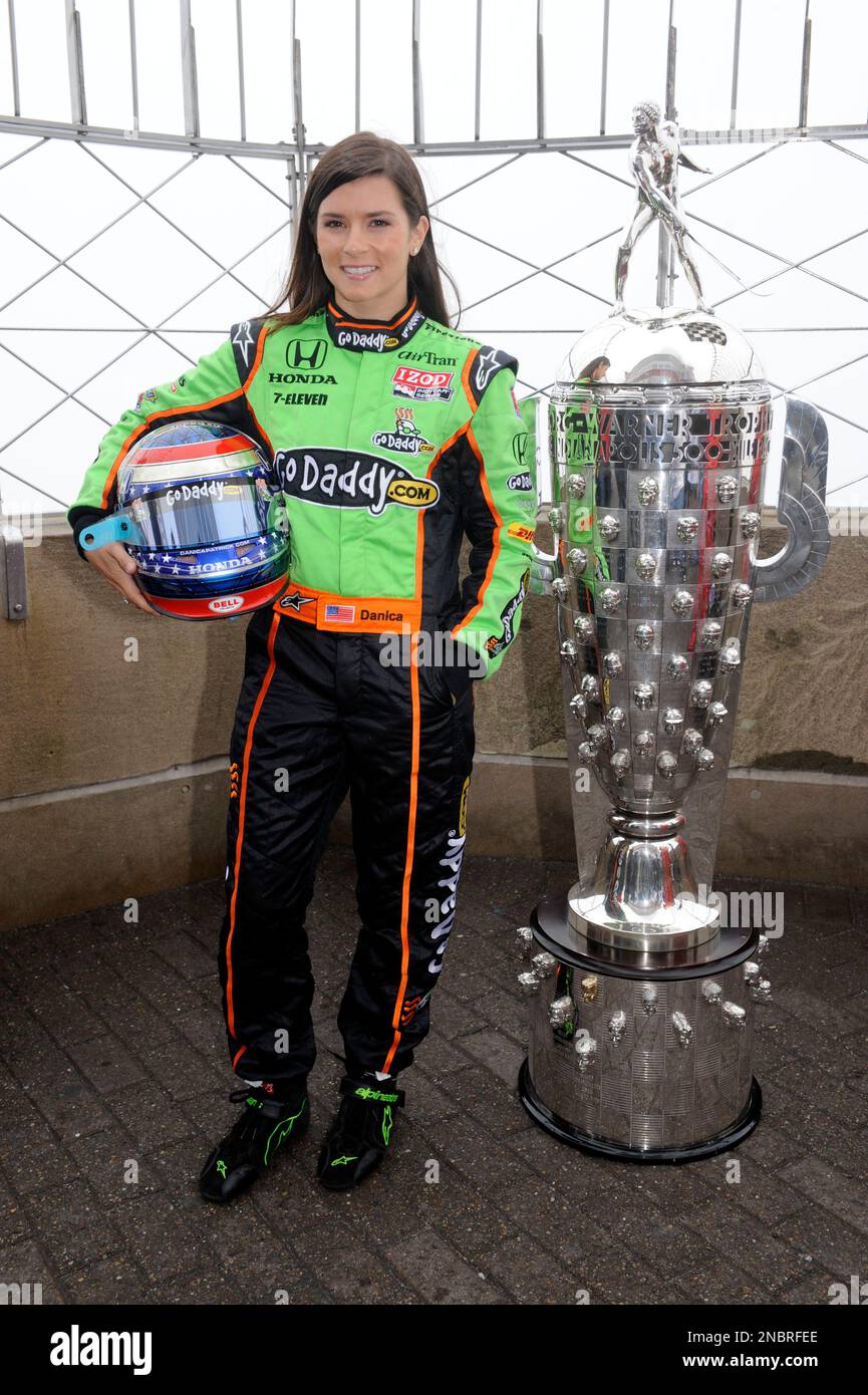 Indy Car driver Danica Patrick poses with the Borg-Warner Trophy, given ...