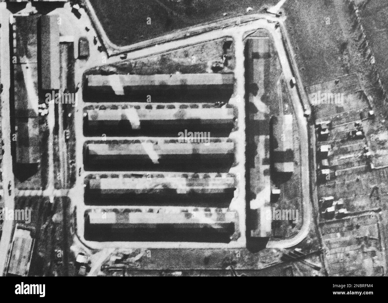 Aerial view before bombing of a group of buildings used as a Signals ...