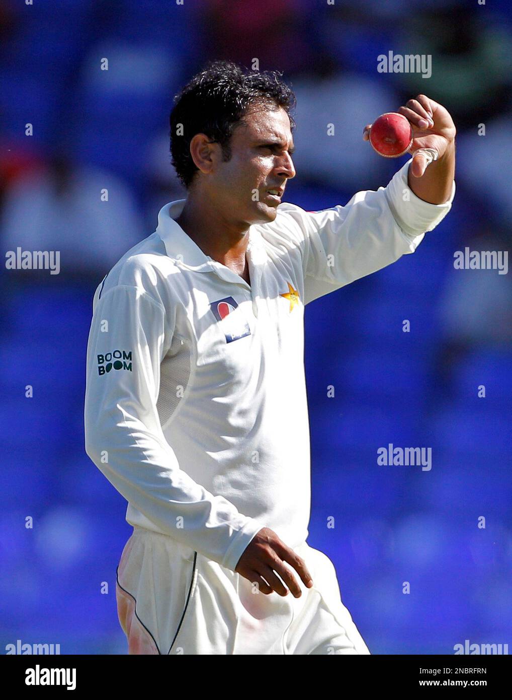 Pakistan's bowler Abdur Rehman focuses on his next delivery during the ...