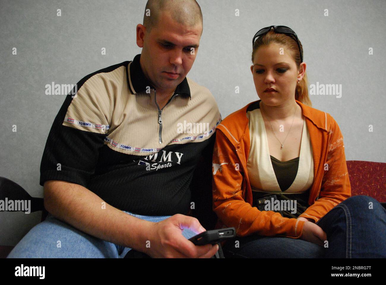 In a March 25, 2011 photo, Spc. James Saylor and his wife, Tiffany ...