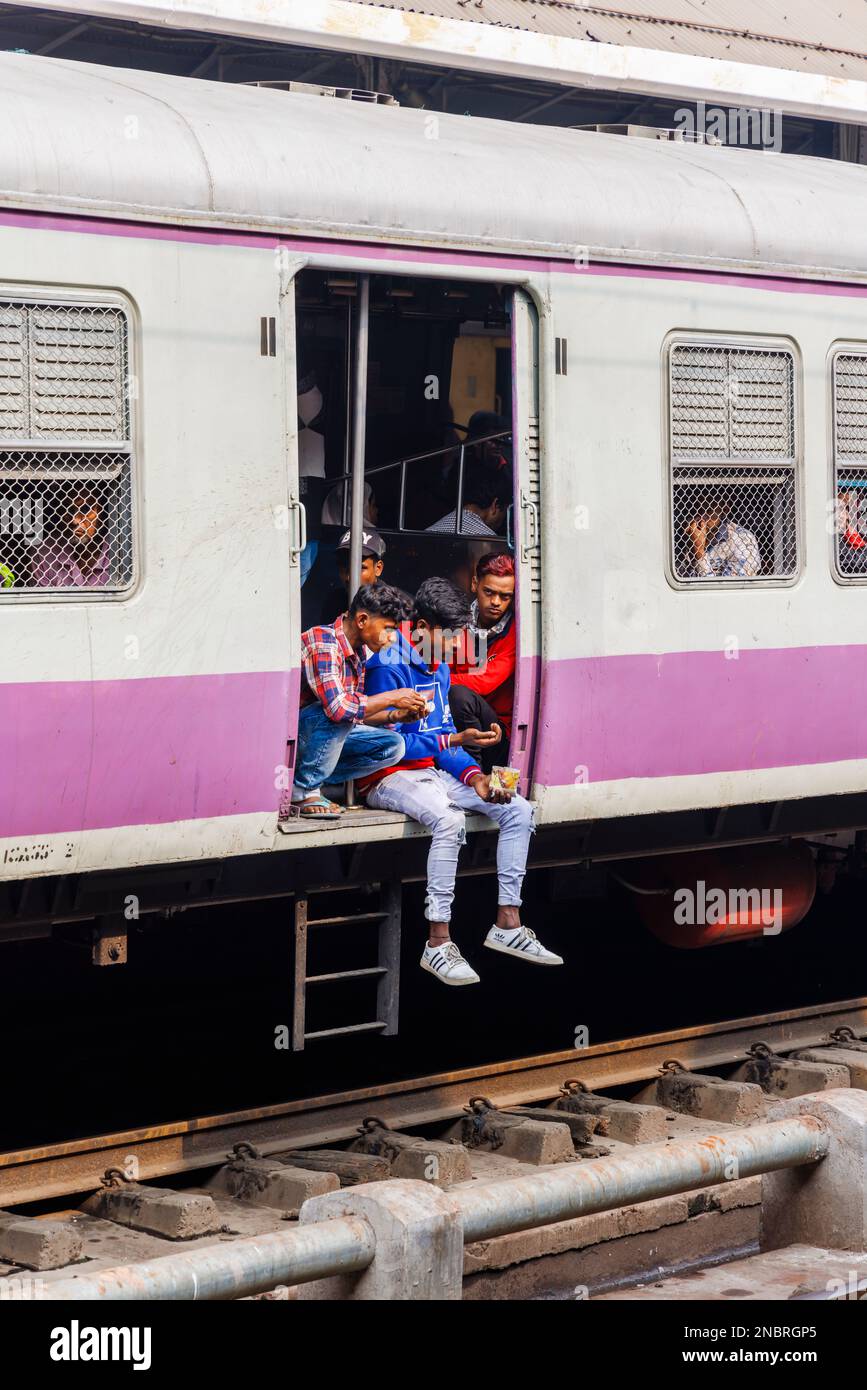 Passengers in an open doorway of a train railway carriage waiting to ...