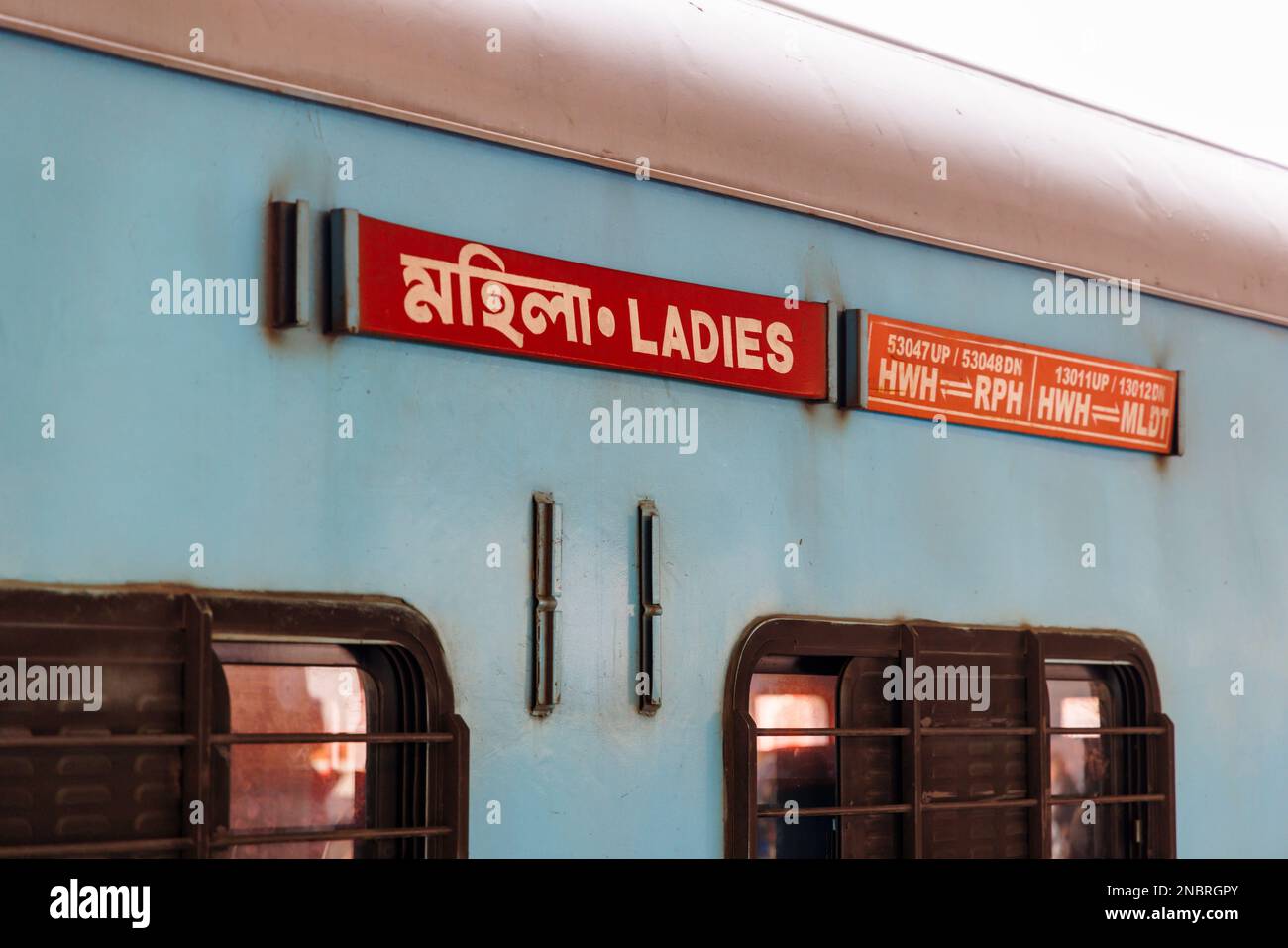 Ladies compartment sign on the exterior of a blue railway carriage car ...