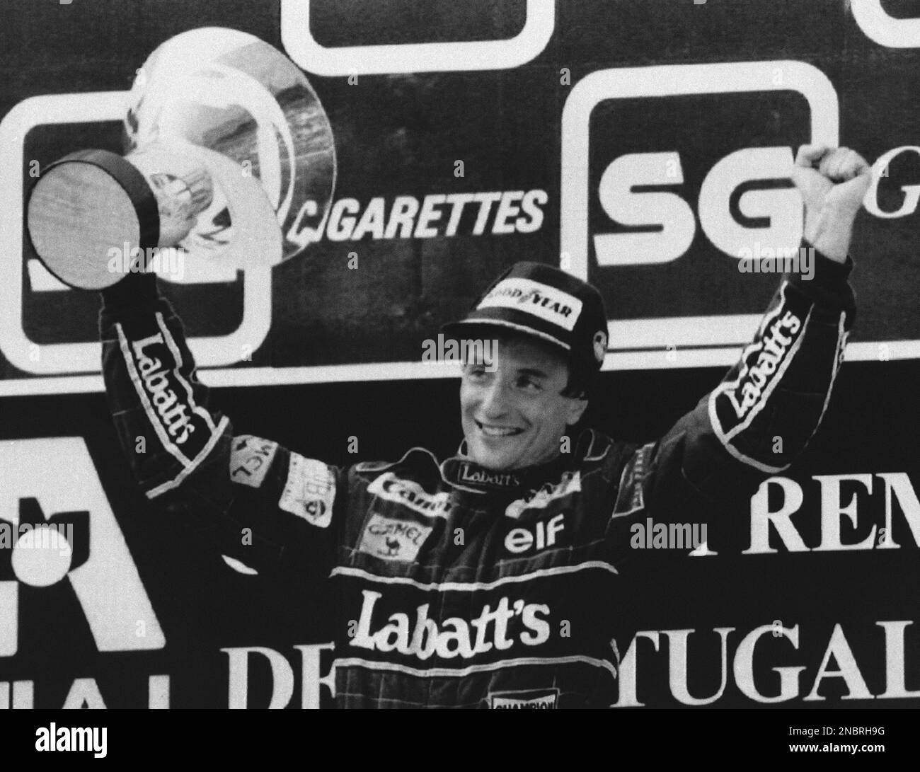 Italian Formula 1 driver Riccardo Patrese with arms aloft after winning ...