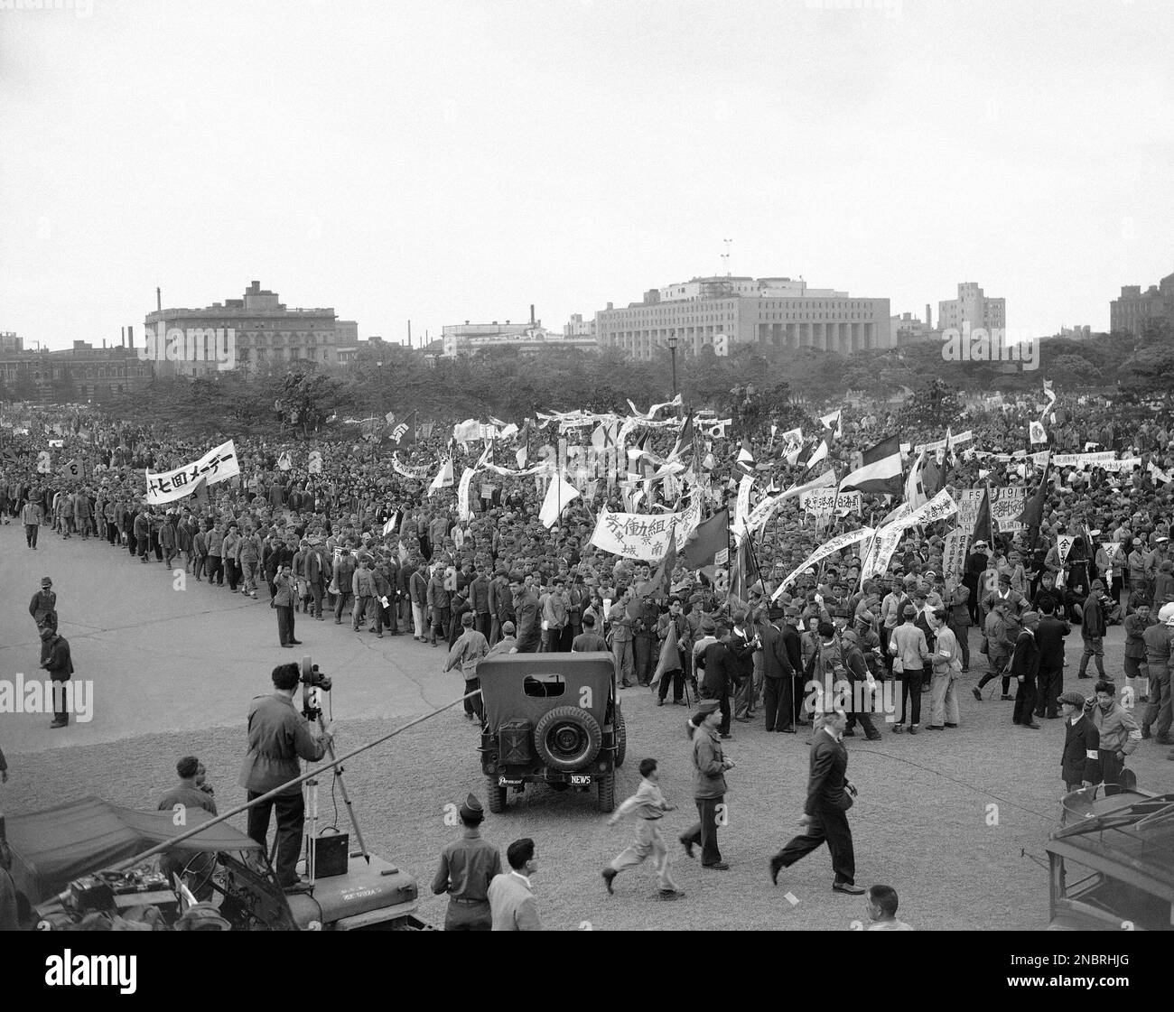 The crowds line up in front of the speakers stand in Tokyo, Japan on ...