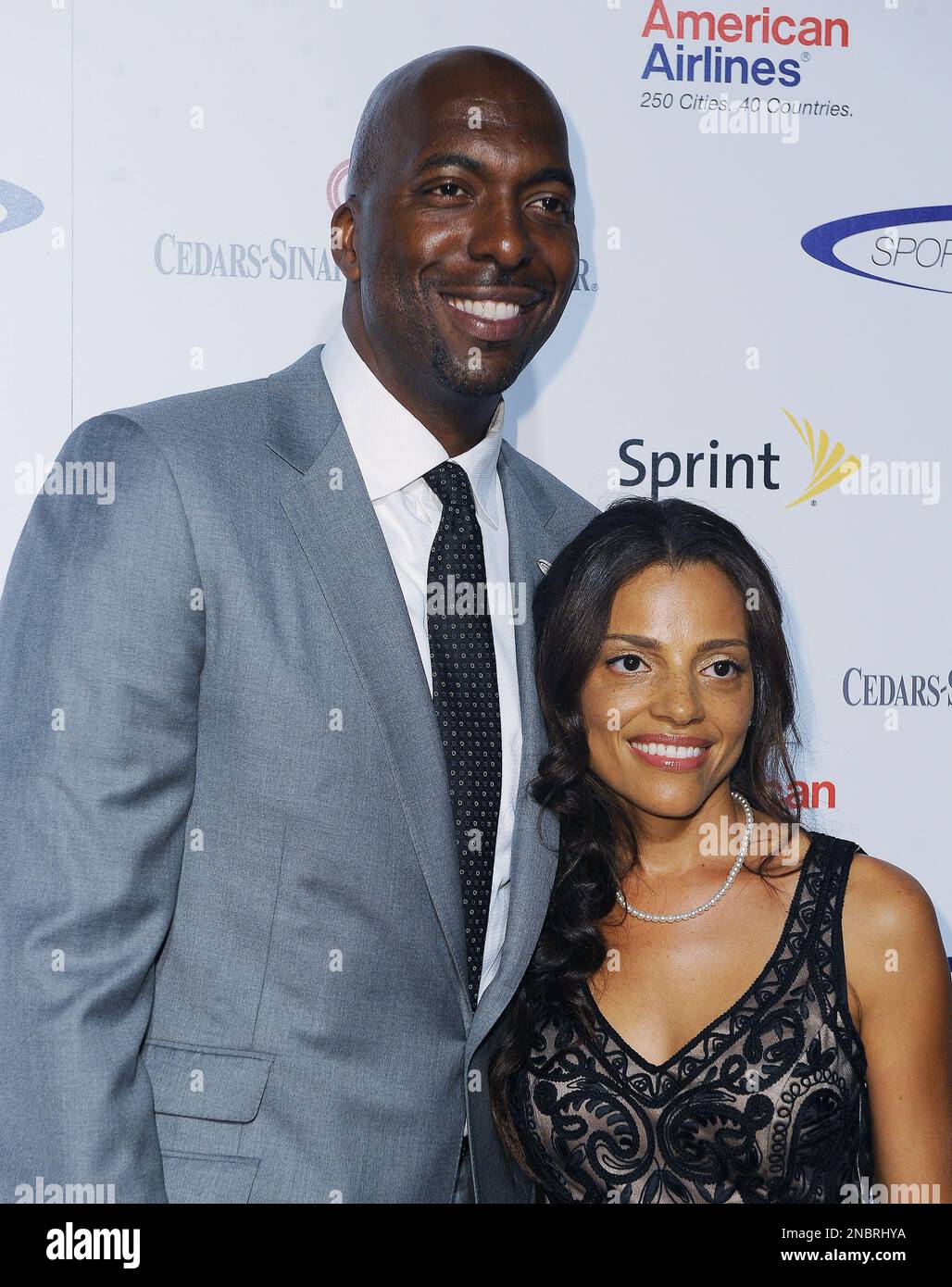 John Salley, at left, and Natasha Duffy arrives at The 26th Annual ...