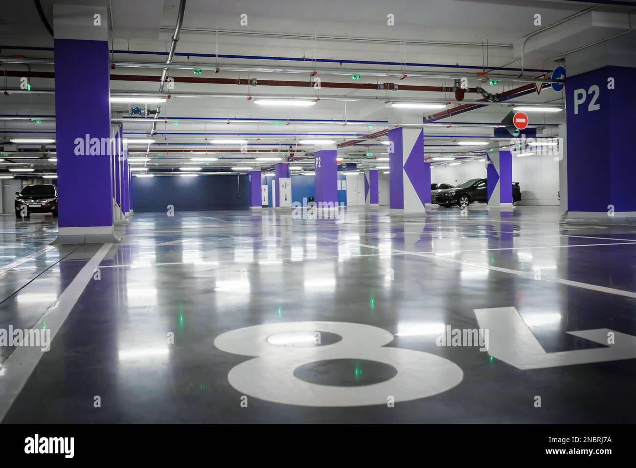 Underground parking. parking for cars, machines Stock Photo - Alamy