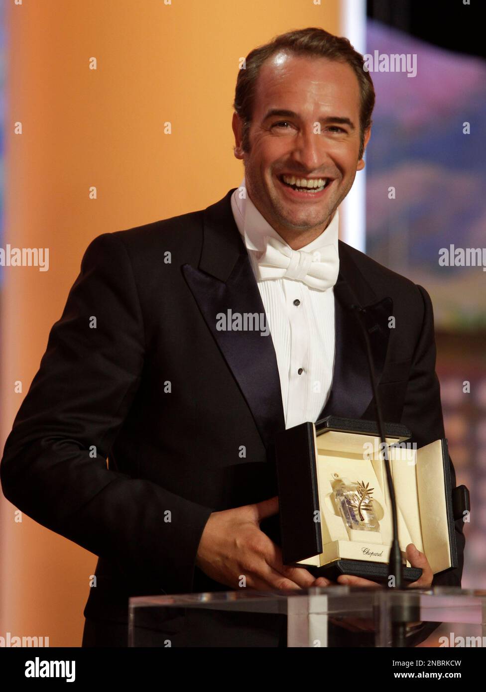 Actor Jean Dujardin poses with the Best Actor award for the film The ...