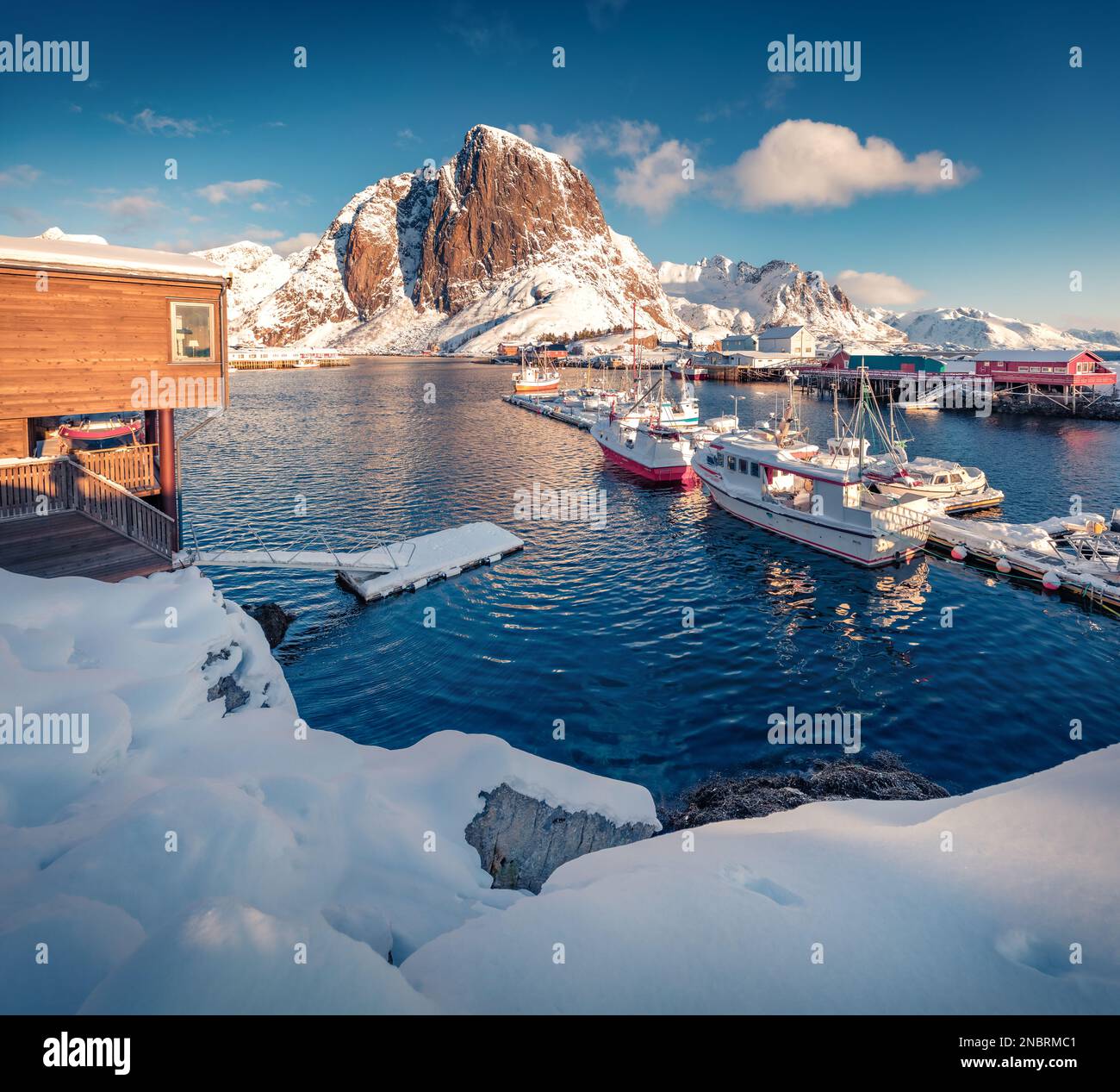 Splendid afternoon on Hamnoy port with Festhaeltinden mount on ...