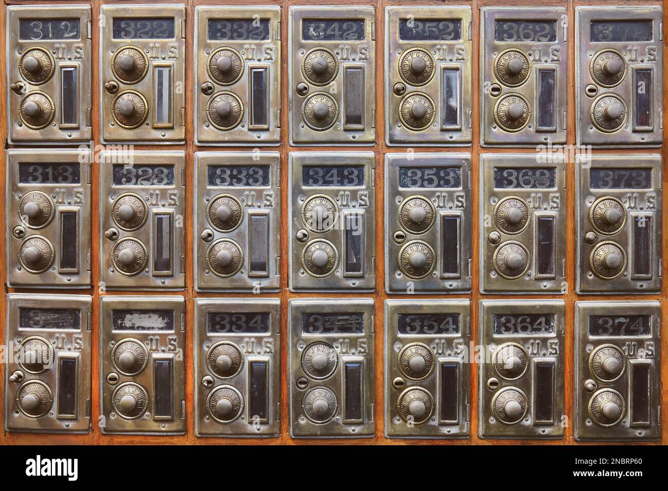 Wooden wall with ancient American safe deposit mail boxes Stock Photo ...