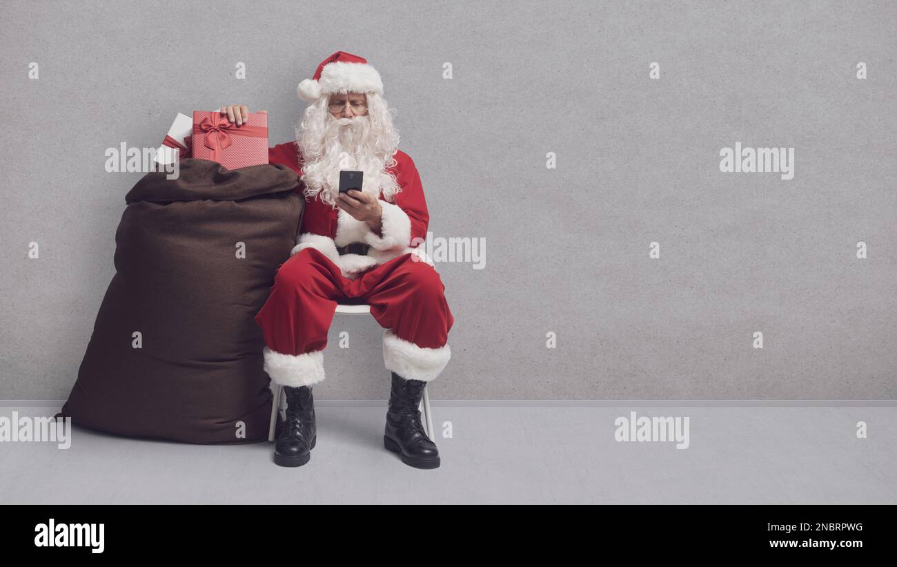Santa frustrated gifts mobile hi-res stock photography and images - Alamy