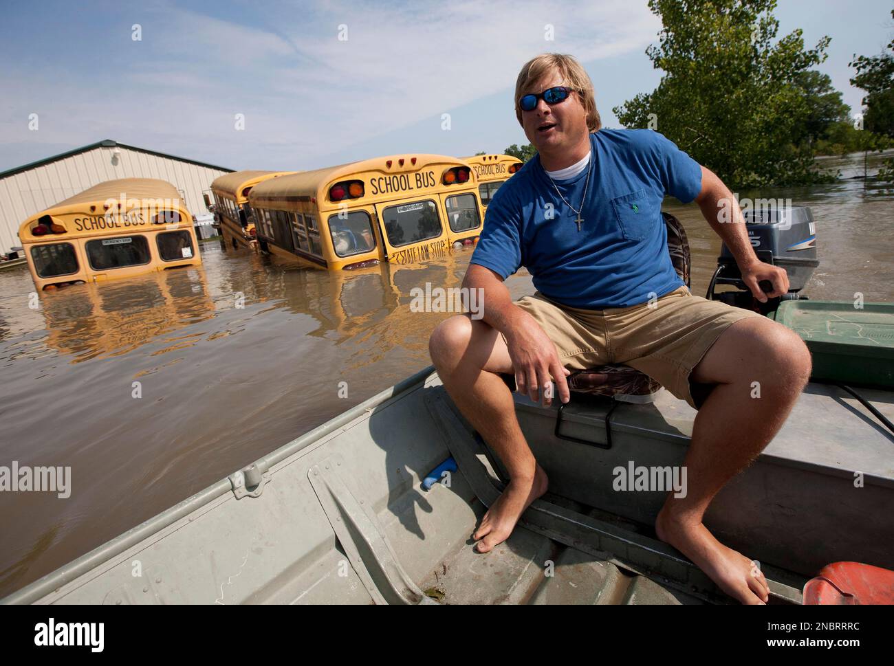 Chris Lynn checks his fathers property which is still surrounded by ...