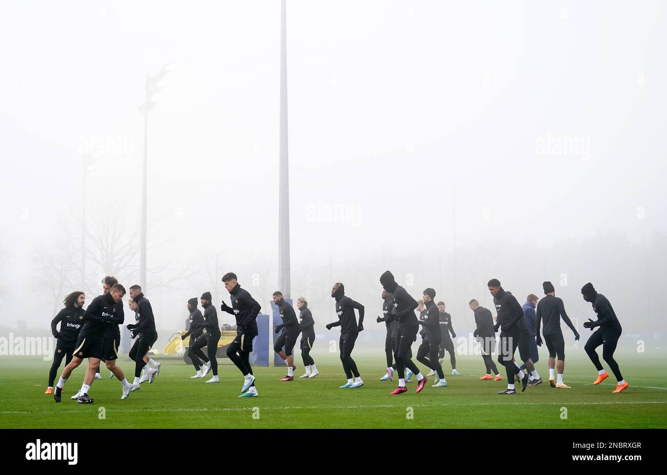 Chelsea players train in the heavy fog at Cobham Training Centre ...