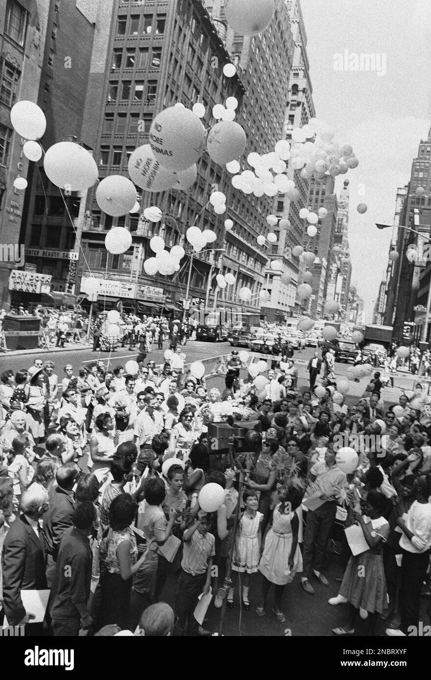Balloons carrying the motto “No more Hiroshima” are released by crowd ...