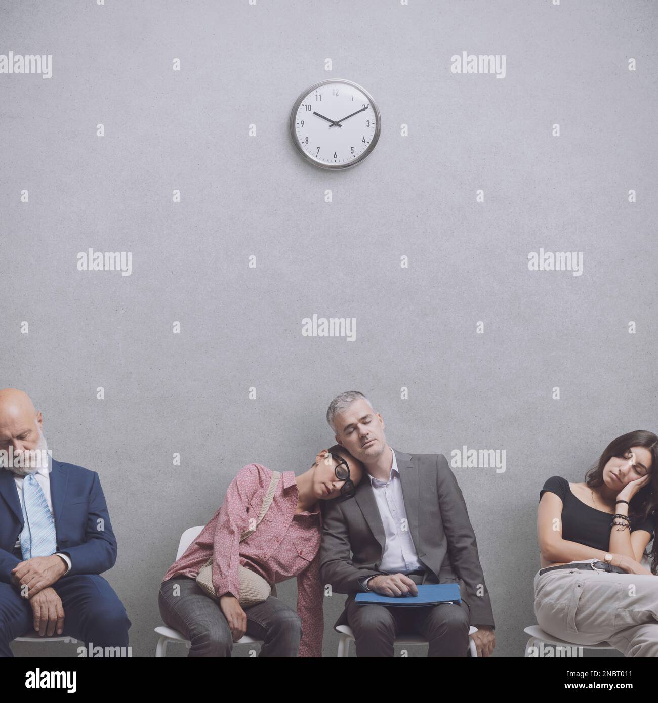 Exhausted candidates waiting for a job interview, they are sitting in ...