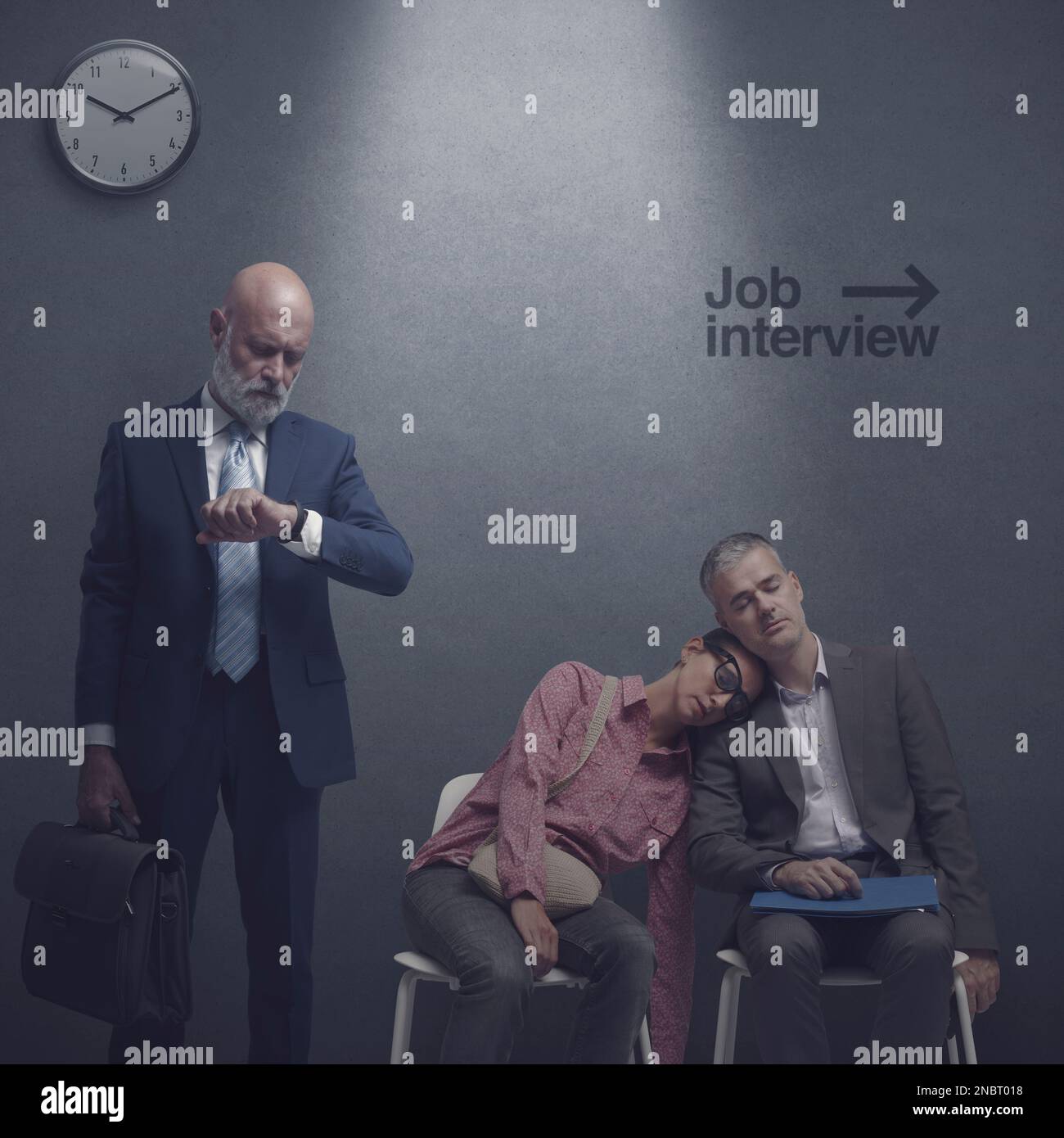 Business people waiting for a job interview: a man is checking the time ...