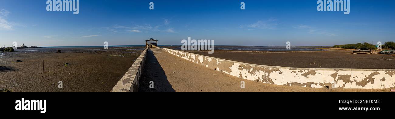 A small jetty in Koteshwar in the Kori Creek at low tide in the western ...