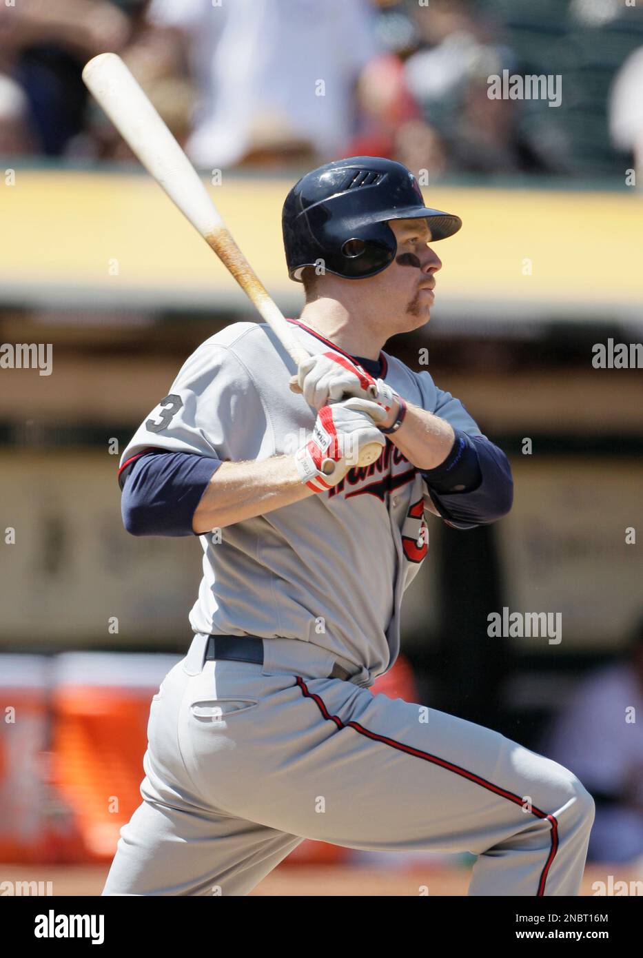 Minnesota Twins' Justin Morneau doubles to right center field during ...