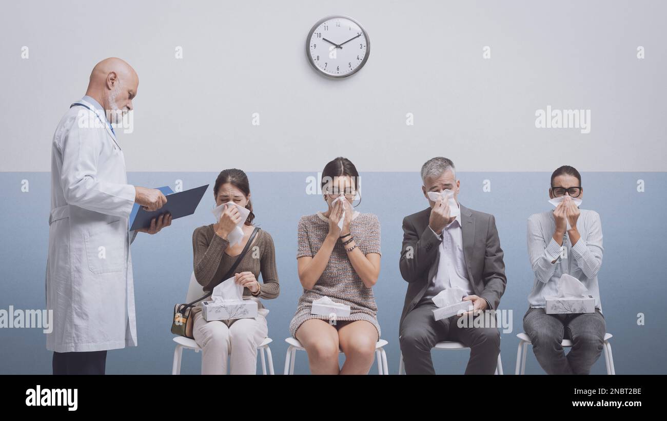 Sick people with cold and flu sitting in the waiting room at the ...