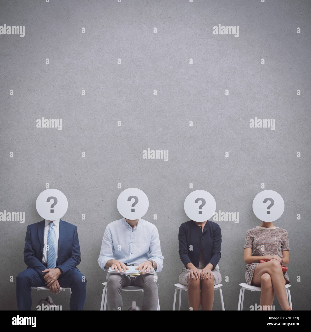 Diverse job candidates sitting in the waiting room and waiting for ...