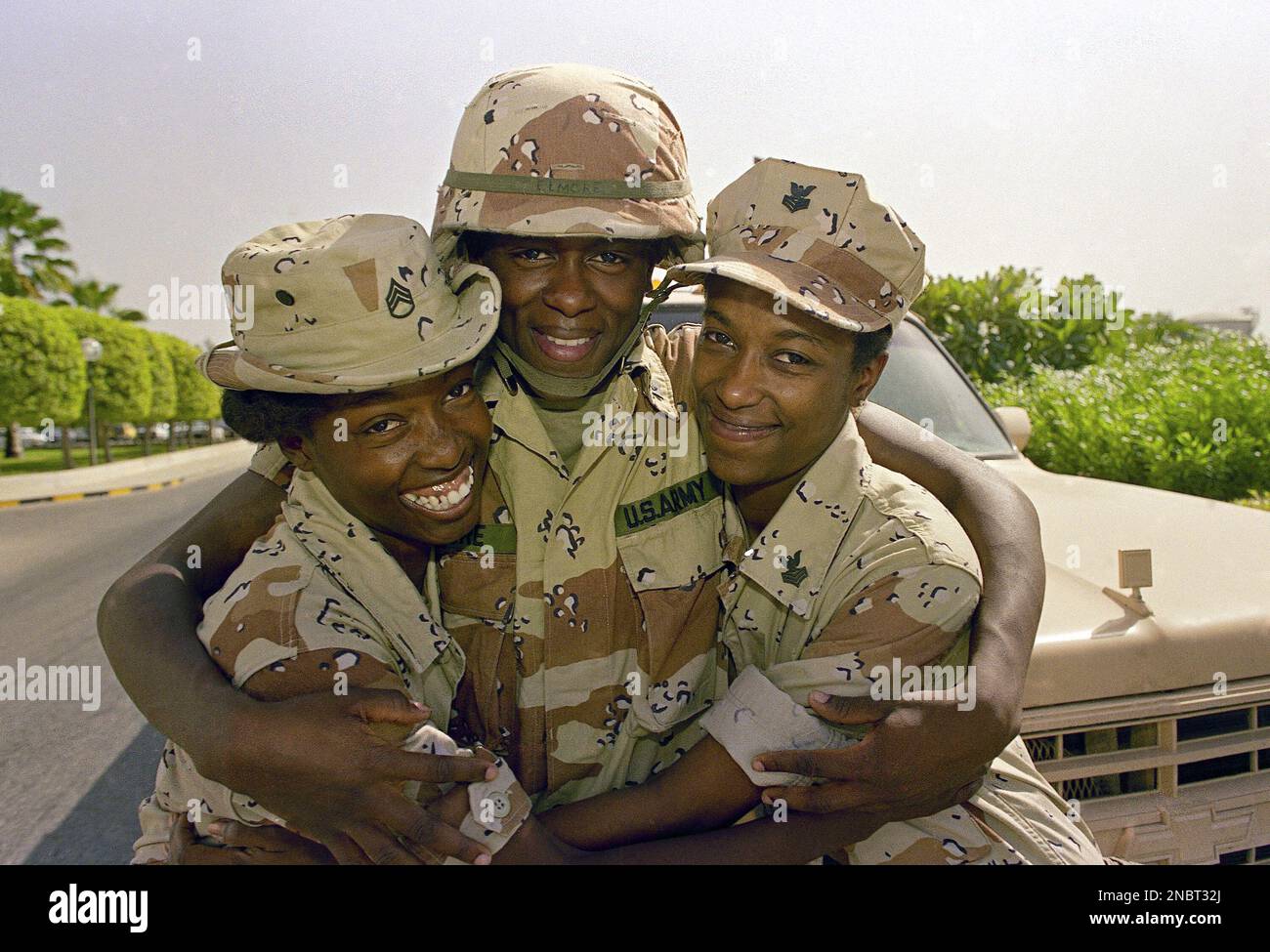 U.S. Army Staff Sgt. Darnetha Elmore, left, and U.S. Navy Petty Officer ...