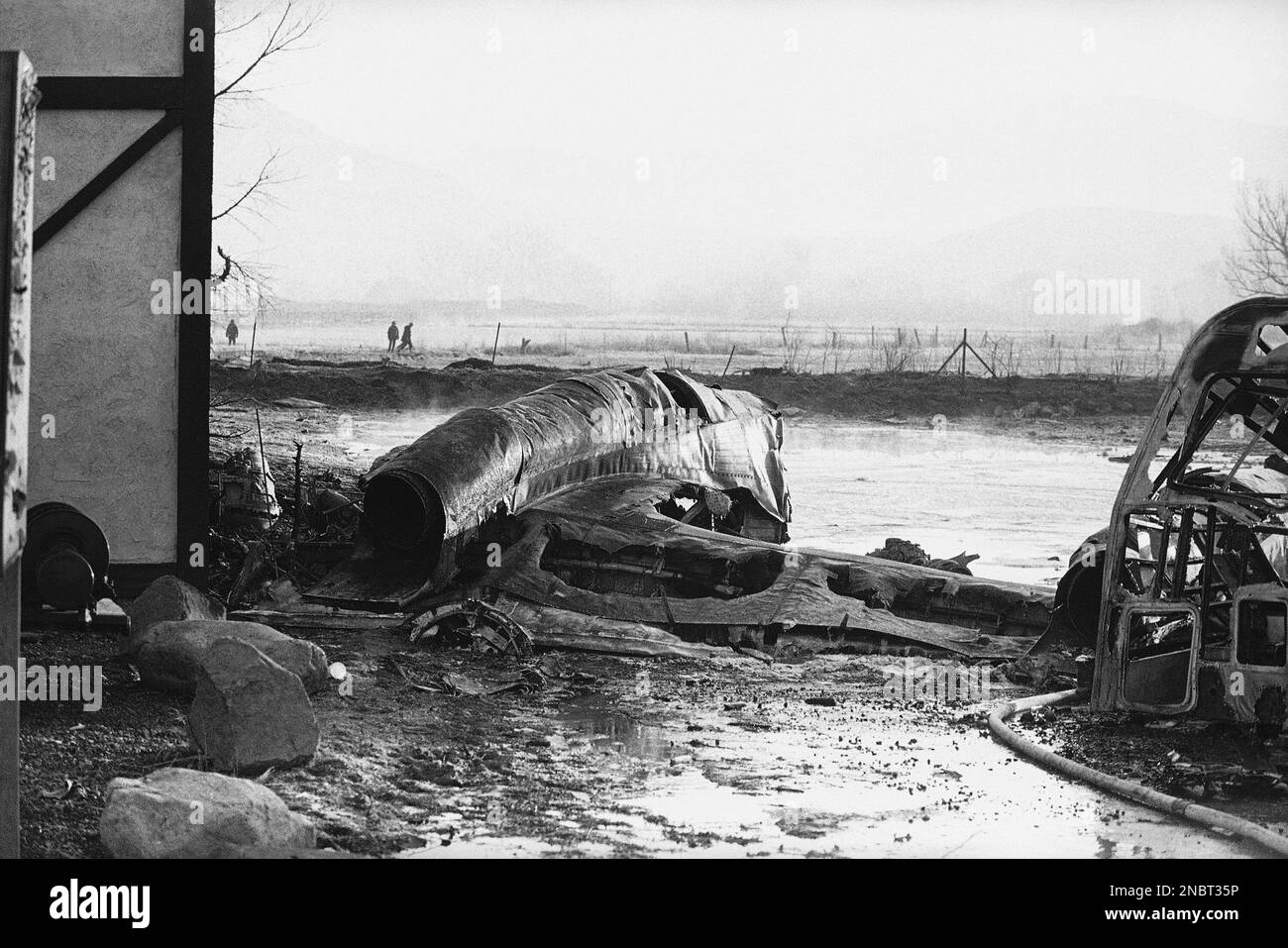 The jet engine lies in a pool of frozen water near U.S. Highway 395 ...