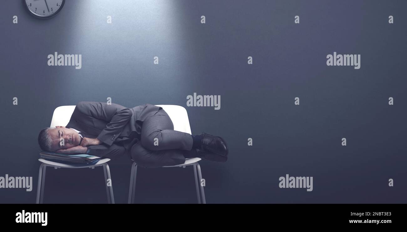 Exhausted job applicant lying on chairs and sleeping in the waiting ...