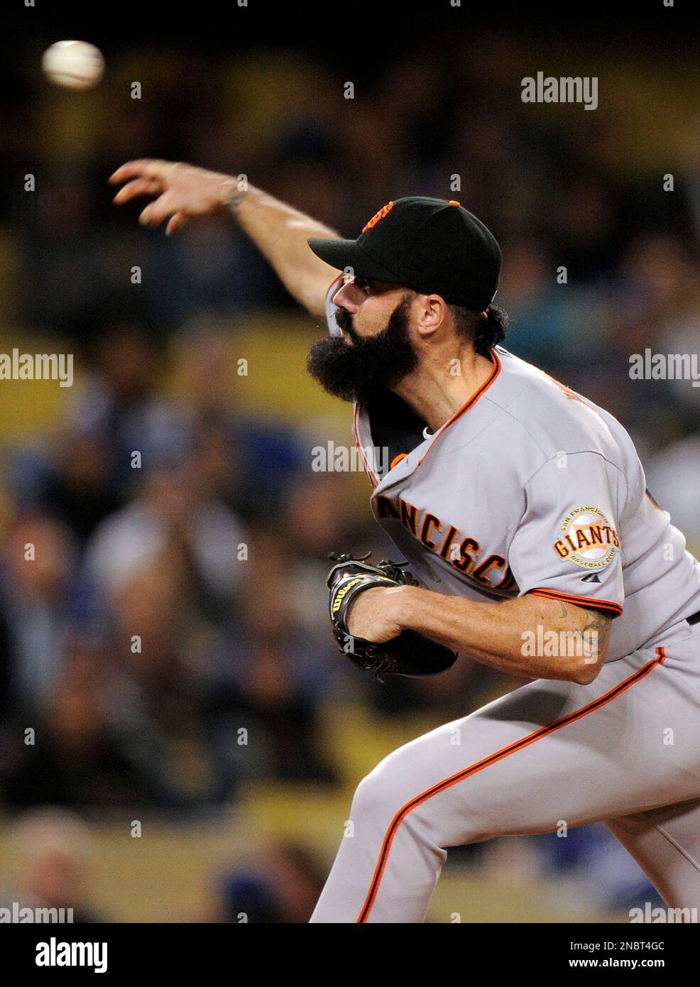 San Francisco Giants relief pitcher Brian Wilson throws to the plate ...