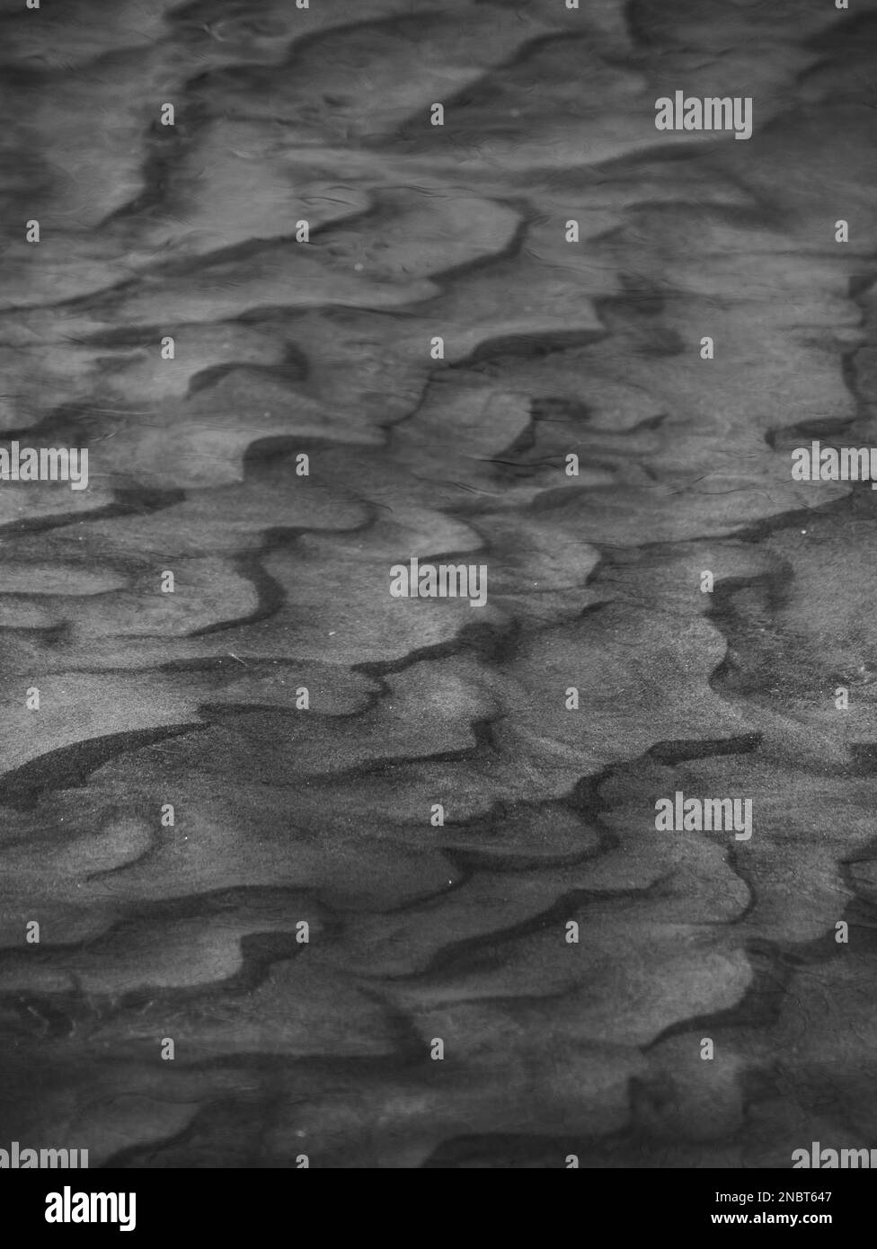 A vertical grayscale texture looking like waves perfect as a background ...