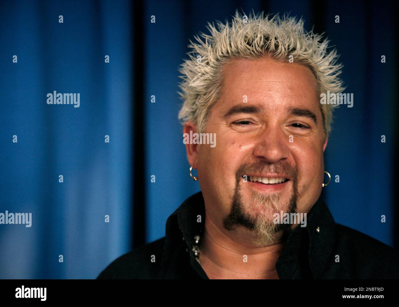 TV personality Guy Fieri poses for a portrait Wednesday, May 4, 2011 in ...