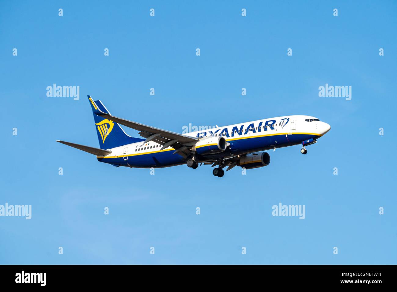 White, blue and yellow Ryanair airline plane with Irish flag and ...