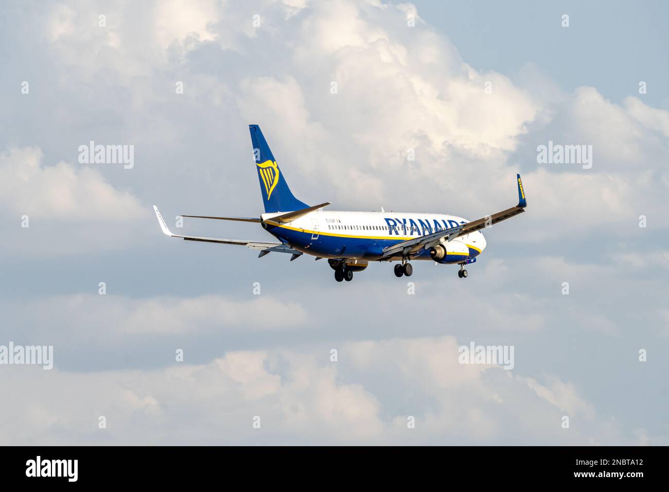 White, blue and yellow Ryanair airline plane with Irish flag and ...
