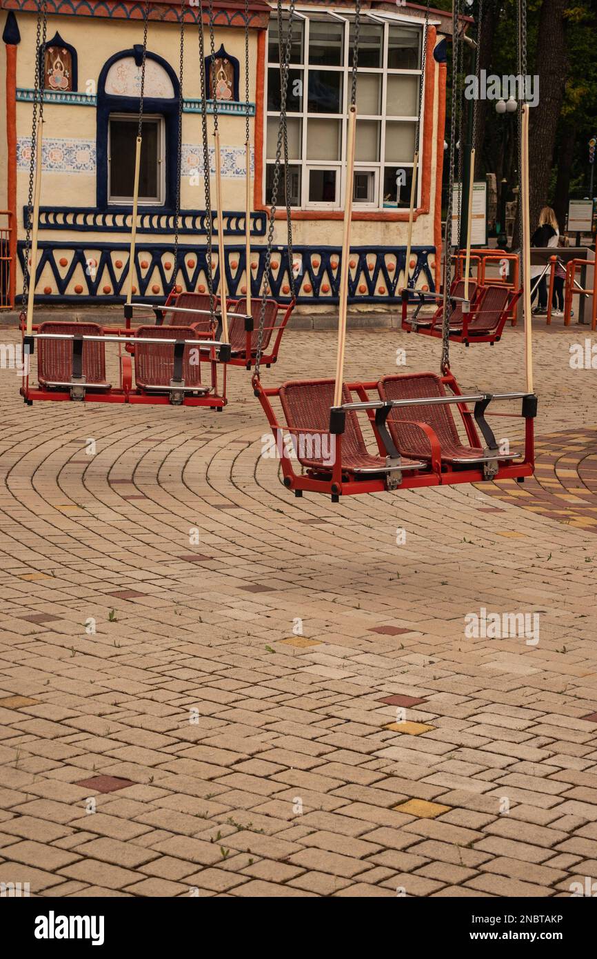 colorful carousel in the amusement park, merry-go-round Stock Photo - Alamy
